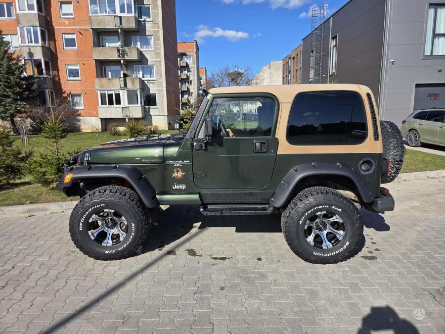 Zaļš Jeep Wrangler 1997 Kretinga, ar dzinēja tilpumu 4.00 L un nobraukumu 155 tūkst. km par 16500 €, foto 5 vietnē AUTOMOTO.COM.LV