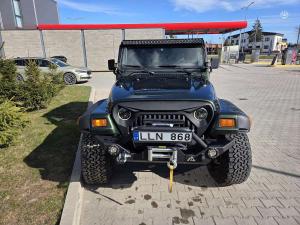Zaļš Jeep Wrangler 1997 Kretinga, ar dzinēja tilpumu 4.00 L un nobraukumu 155 tūkst. km par 16500 €, foto 6 vietnē AUTOMOTO.COM.LV