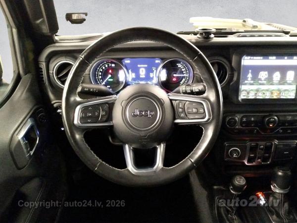 Green Jeep Wrangler 2021 in Tallinn, with an engine capacity of 2.00 L and mileage of 56 thousand km for 42990 €, photo 4 on AUTOMOTO.COM.LV