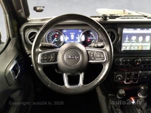 Green Jeep Wrangler 2021 in Tallinn, with an engine capacity of 2.00 L and mileage of 56 thousand km for 42990 €, photo 5 on AUTOMOTO.COM.LV
