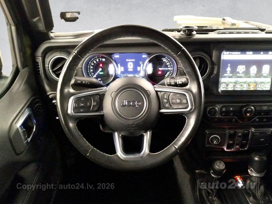 Green Jeep Wrangler 2021 in Tallinn, with an engine capacity of 2.00 L and mileage of 56 thousand km for 42990 €, photo 5 on AUTOMOTO.COM.LV