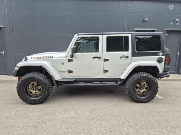 Grey Jeep Wrangler 2010 in Raseiniai, with an engine capacity of 2.78 L and mileage of 212 thousand km for 21900 €, photo 7 on AUTOMOTO.COM.LV