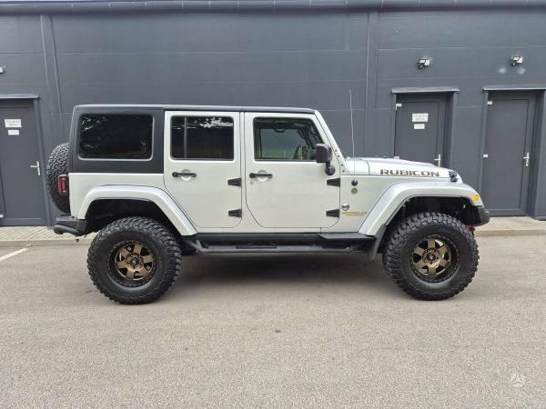 Pelēks Jeep Wrangler 2010 Raseiniai, ar dzinēja tilpumu 2.78 L un nobraukumu 212 tūkst. km par 21900 €, foto 8 vietnē AUTOMOTO.COM.LV
