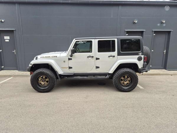 Pelēks Jeep Wrangler 2010 Raseiniai, ar dzinēja tilpumu 2.78 L un nobraukumu 212 tūkst. km par 21900 €, foto 9 vietnē AUTOMOTO.COM.LV