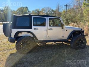 Grey Jeep Wrangler 2012 in Riga, with an engine capacity of 3.60 L and mileage of 170 thousand km for 16000 €, photo 10 on AUTOMOTO.COM.LV