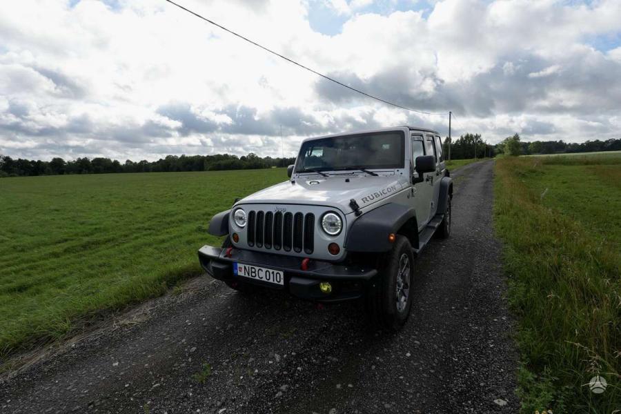 Grey Jeep Wrangler 2012 in Vilnius, with an engine capacity of 2.78 L and mileage of 197 thousand km for 22900 €, photo 3 on AUTOMOTO.COM.LV