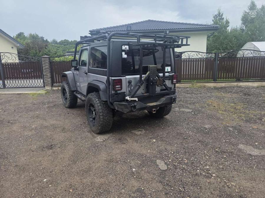 Grey Jeep Wrangler 2013 in Vilnius, with an engine capacity of 3.60 L and mileage of 160 thousand km for 15700 €, photo 3 on AUTOMOTO.COM.LV