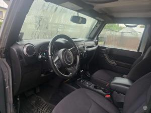 Grey Jeep Wrangler 2013 in Vilnius, with an engine capacity of 3.60 L and mileage of 160 thousand km for 15700 €, photo 4 on AUTOMOTO.COM.LV