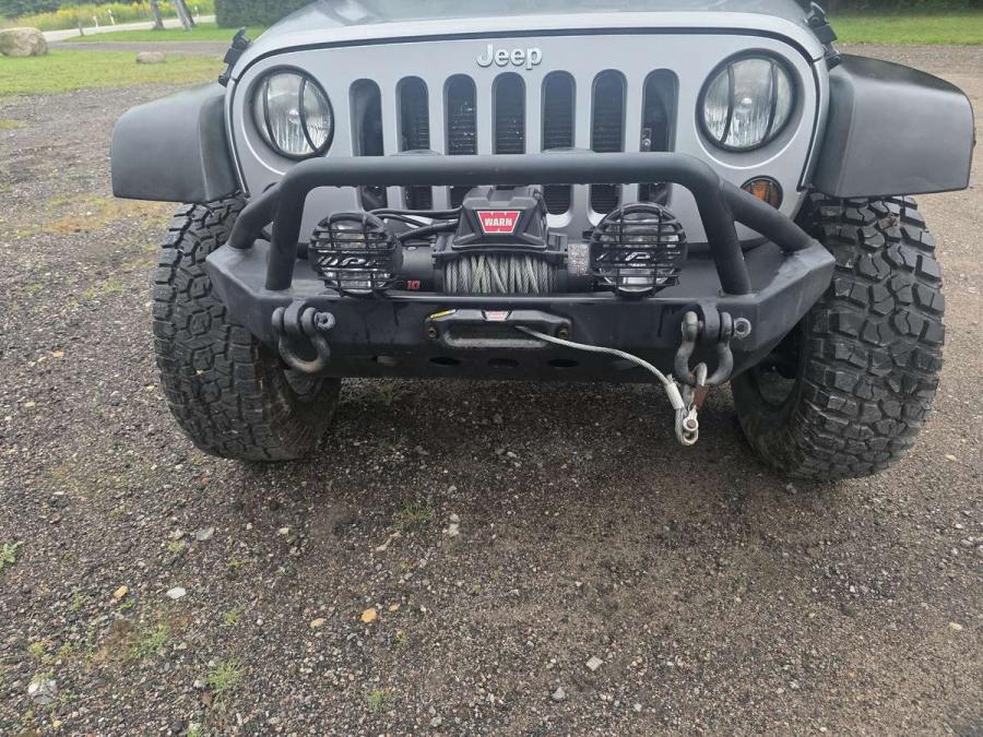 Grey Jeep Wrangler 2013 in Vilnius, with an engine capacity of 3.60 L and mileage of 160 thousand km for 15700 €, photo 8 on AUTOMOTO.COM.LV