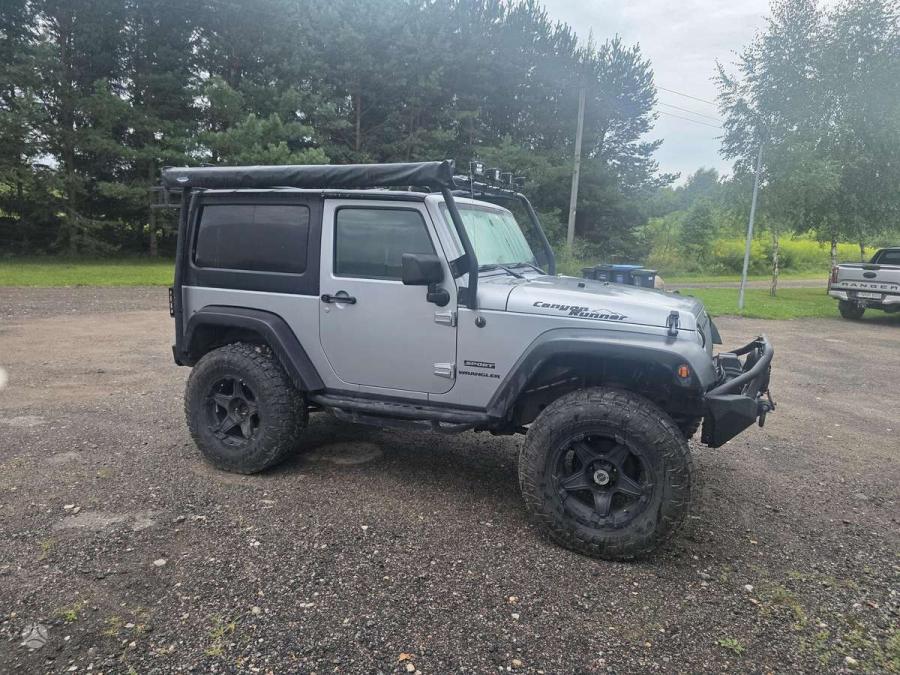 Grey Jeep Wrangler 2013 in Vilnius, with an engine capacity of 3.60 L and mileage of 160 thousand km for 15700 €, photo 10 on AUTOMOTO.COM.LV