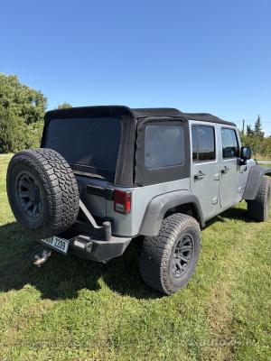 Grey Jeep Wrangler 2014 in Tallinn, with an engine capacity of 3.60 L and mileage of 0 thousand km for 19600 €, photo 6 on AUTOMOTO.COM.LV