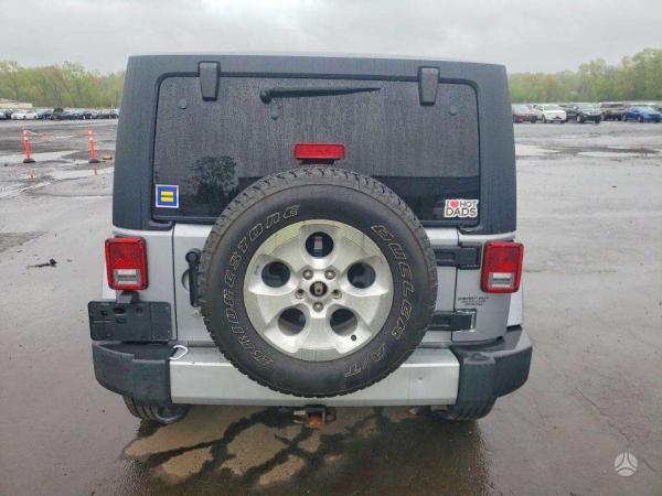 Grey Jeep Wrangler 2014 in Klaipeda, with an engine capacity of 3.60 L and mileage of 130 thousand km for 6250 €, photo 7 on AUTOMOTO.COM.LV