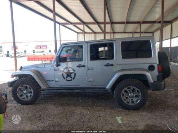 Pelēks Jeep Wrangler 2015 Klaipėda, ar dzinēja tilpumu 3.60 L un nobraukumu 90 tūkst. km par 10000 €, foto 1 vietnē AUTOMOTO.COM.LV