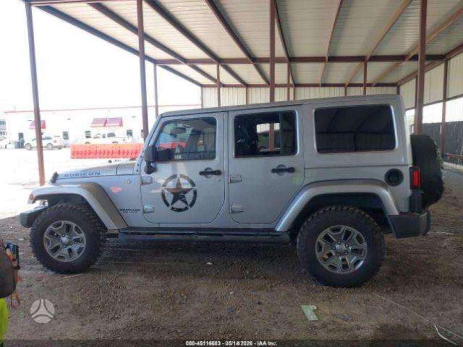 Pelēks Jeep Wrangler 2015 Klaipėda, ar dzinēja tilpumu 3.60 L un nobraukumu 90 tūkst. km par 10000 €, foto 1 vietnē AUTOMOTO.COM.LV
