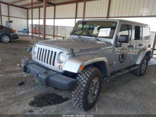 Pelēks Jeep Wrangler 2015 Klaipėda, ar dzinēja tilpumu 3.60 L un nobraukumu 90 tūkst. km par 10000 €, foto 2 vietnē AUTOMOTO.COM.LV