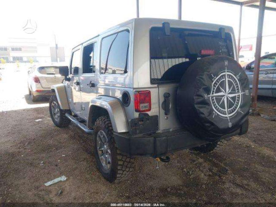Pelēks Jeep Wrangler 2015 Klaipėda, ar dzinēja tilpumu 3.60 L un nobraukumu 90 tūkst. km par 10000 €, foto 4 vietnē AUTOMOTO.COM.LV