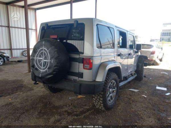 Pelēks Jeep Wrangler 2015 Klaipėda, ar dzinēja tilpumu 3.60 L un nobraukumu 90 tūkst. km par 10000 €, foto 6 vietnē AUTOMOTO.COM.LV