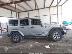 Pelēks Jeep Wrangler 2015 Klaipėda, ar dzinēja tilpumu 3.60 L un nobraukumu 90 tūkst. km par 10000 €, foto 8 vietnē AUTOMOTO.COM.LV