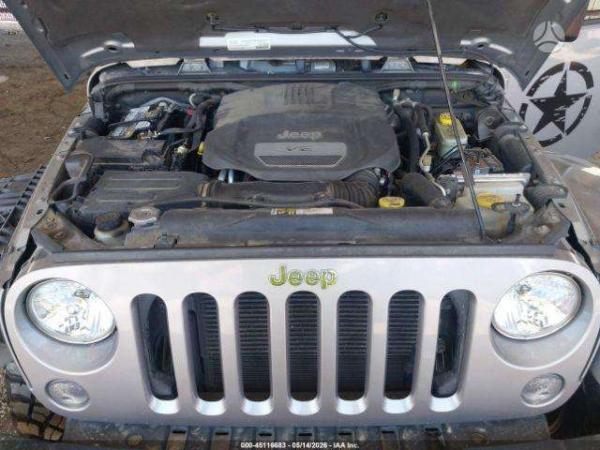 Pelēks Jeep Wrangler 2015 Klaipėda, ar dzinēja tilpumu 3.60 L un nobraukumu 90 tūkst. km par 10000 €, foto 9 vietnē AUTOMOTO.COM.LV