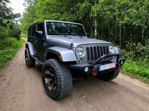 Grey Jeep Wrangler 2016 in Siauliai, with an engine capacity of 3.60 L and mileage of 217 thousand km for 12800 €, photo  on AUTOMOTO.COM.LV
