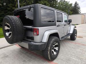 Grey Jeep Wrangler 2016 in Siauliai, with an engine capacity of 3.60 L and mileage of 217 thousand km for 12800 €, photo 4 on AUTOMOTO.COM.LV