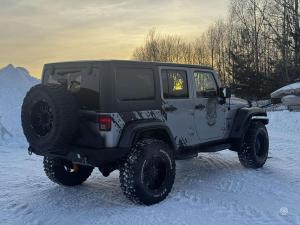 Pelēks Jeep Wrangler 2017 Viļņa, ar dzinēja tilpumu 3.60 L un nobraukumu 120 tūkst. km par 27000 €, foto 3 vietnē AUTOMOTO.COM.LV