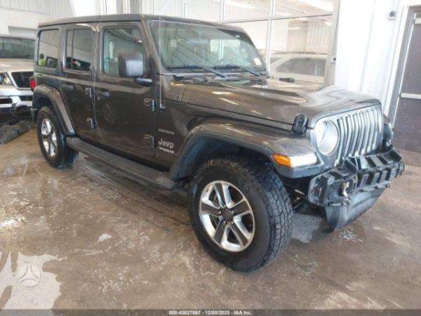 Grey Jeep Wrangler 2019 in Klaipeda, with an engine capacity of 2.00 L and mileage of 149 thousand km for 8700 €, photo 1 on AUTOMOTO.COM.LV