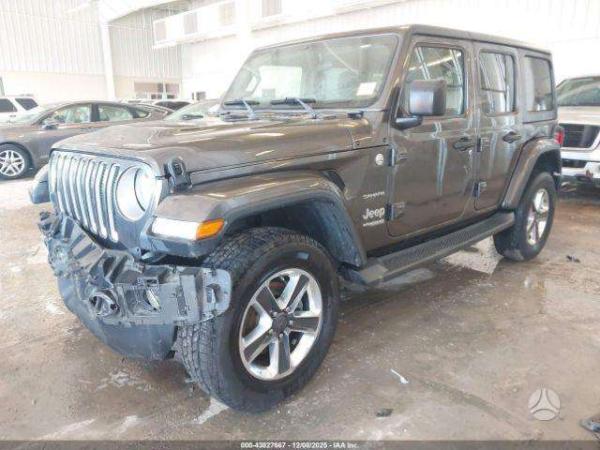 Grey Jeep Wrangler 2019 in Klaipeda, with an engine capacity of 2.00 L and mileage of 149 thousand km for 8700 €, photo 2 on AUTOMOTO.COM.LV