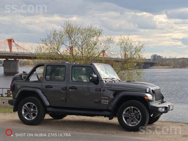 Pelēks Jeep Wrangler 2021 Rīga, ar dzinēja tilpumu 2.00 L un nobraukumu 50 tūkst. km par 42600 €, foto 1 vietnē AUTOMOTO.COM.LV