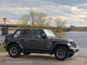 Pelēks Jeep Wrangler 2021 Rīga, ar dzinēja tilpumu 2.00 L un nobraukumu 50 tūkst. km par 42600 €, foto  vietnē AUTOMOTO.COM.LV