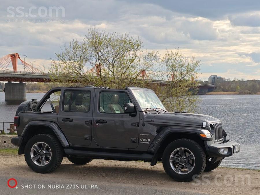 Pelēks Jeep Wrangler 2021 Rīga, ar dzinēja tilpumu 2.00 L un nobraukumu 50 tūkst. km par 42600 €, foto 1 vietnē AUTOMOTO.COM.LV