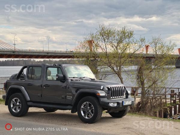 Pelēks Jeep Wrangler 2021 Rīga, ar dzinēja tilpumu 2.00 L un nobraukumu 50 tūkst. km par 42600 €, foto 2 vietnē AUTOMOTO.COM.LV