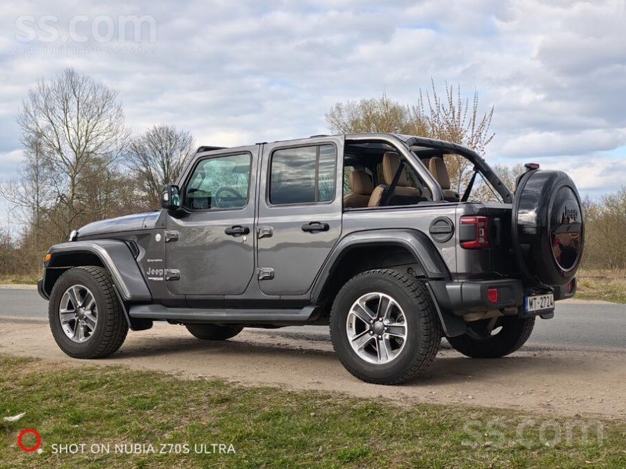 Pelēks Jeep Wrangler 2021 Rīga, ar dzinēja tilpumu 2.00 L un nobraukumu 50 tūkst. km par 42600 €, foto 4 vietnē AUTOMOTO.COM.LV