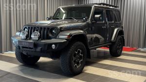 Grey Jeep Wrangler 2022 in Riga, with an engine capacity of 2.00 L and mileage of 85 thousand km for 69900 €, photo  on AUTOMOTO.COM.LV