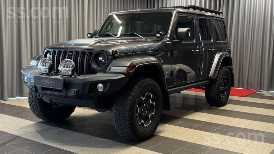 Grey Jeep Wrangler 2022 in Riga, with an engine capacity of 2.00 L and mileage of 85 thousand km for 69900 €, photo 1 on AUTOMOTO.COM.LV