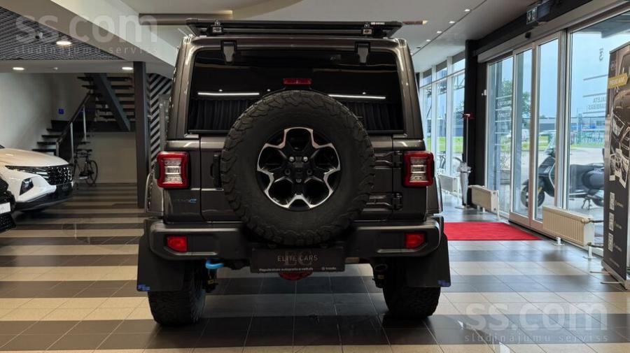 Grey Jeep Wrangler 2022 in Riga, with an engine capacity of 2.00 L and mileage of 85 thousand km for 69900 €, photo 5 on AUTOMOTO.COM.LV