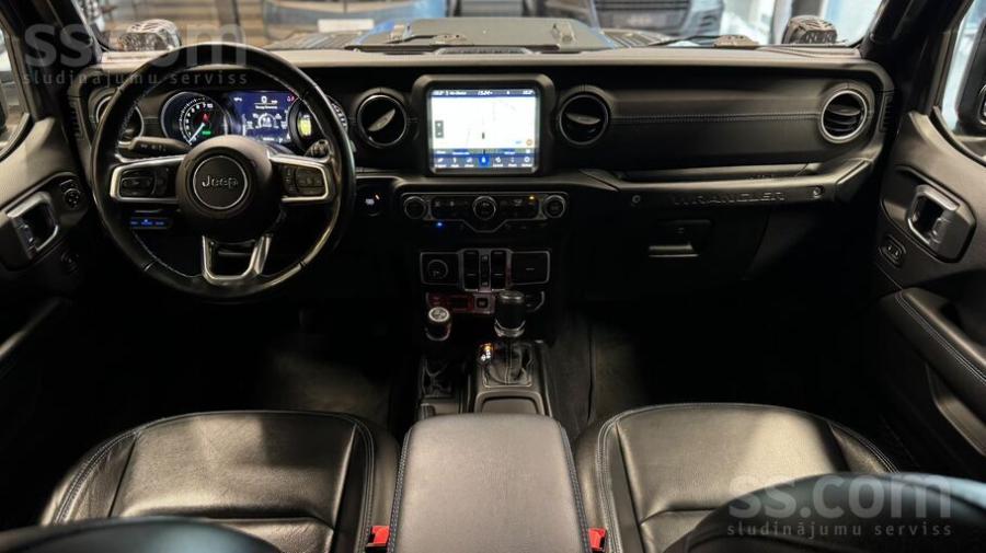 Grey Jeep Wrangler 2022 in Riga, with an engine capacity of 2.00 L and mileage of 85 thousand km for 69900 €, photo 10 on AUTOMOTO.COM.LV