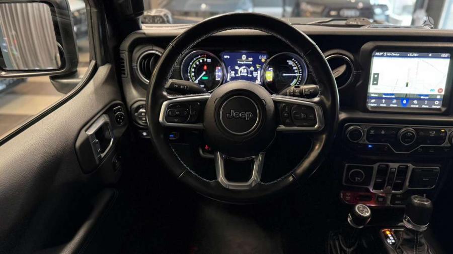Grey Jeep Wrangler 2022 in Riga, with an engine capacity of 2.00 L and mileage of 85 thousand km for 69990 €, photo 11 on AUTOMOTO.COM.LV
