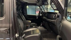 Grey Jeep Wrangler 2022 in Riga, with an engine capacity of 2.00 L and mileage of 85 thousand km for 69990 €, photo 19 on AUTOMOTO.COM.LV