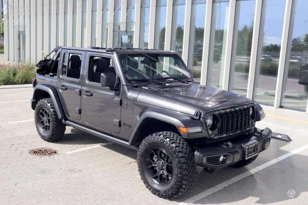Pelēks Jeep Wrangler 2024 Viļņa, ar dzinēja tilpumu 3.60 L un nobraukumu 15 tūkst. km par 37999 €, foto 10 vietnē AUTOMOTO.COM.LV