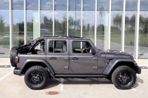 Grey Jeep Wrangler 2024 in Vilnius, with an engine capacity of 3.60 L and mileage of 15 thousand km for 37999 €, photo 12 on AUTOMOTO.COM.LV