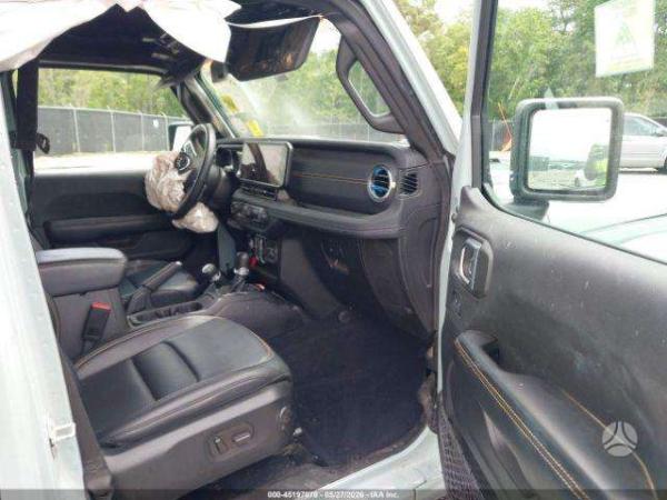 Grey Jeep Wrangler 2024 in Klaipeda, with an engine capacity of 2.00 L and mileage of 90 thousand km for 12300 €, photo 6 on AUTOMOTO.COM.LV