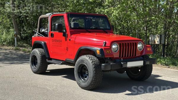 Red Jeep Wrangler 2005 in Riga, with an engine capacity of 4.00 L and mileage of 121 thousand km for 10500 €, photo 3 on AUTOMOTO.COM.LV