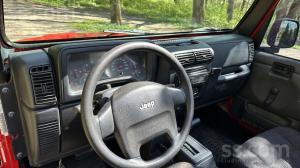 Red Jeep Wrangler 2005 in Riga, with an engine capacity of 4.00 L and mileage of 121 thousand km for 10500 €, photo 8 on AUTOMOTO.COM.LV
