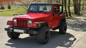 Red Jeep Wrangler 2005 in Riga, with an engine capacity of 4.00 L and mileage of 121 thousand km for 10500 €, photo  on AUTOMOTO.COM.LV