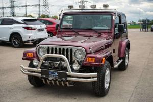 Sarkans Jeep Wrangler 2003 Marijampole, ar dzinēja tilpumu 4.00 L un nobraukumu 22 tūkst. km par 18850 €, foto 5 vietnē AUTOMOTO.COM.LV