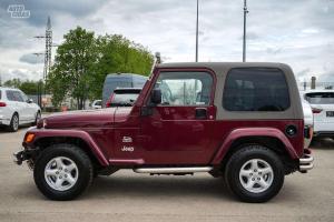 Sarkans Jeep Wrangler 2003 Marijampole, ar dzinēja tilpumu 4.00 L un nobraukumu 22 tūkst. km par 18850 €, foto 7 vietnē AUTOMOTO.COM.LV