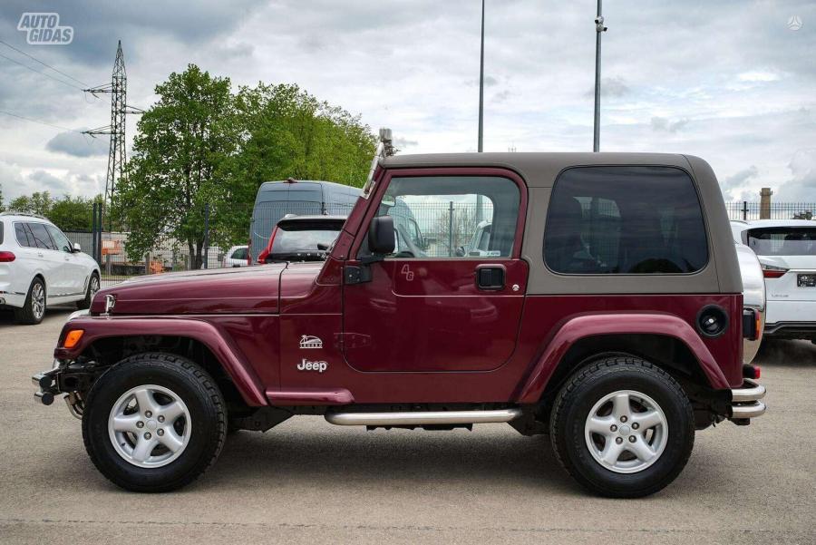 Sarkans Jeep Wrangler 2003 Marijampole, ar dzinēja tilpumu 4.00 L un nobraukumu 22 tūkst. km par 18850 €, foto 7 vietnē AUTOMOTO.COM.LV