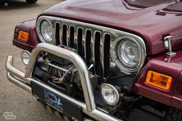 Sarkans Jeep Wrangler 2003 Marijampole, ar dzinēja tilpumu 4.00 L un nobraukumu 22 tūkst. km par 18850 €, foto 8 vietnē AUTOMOTO.COM.LV