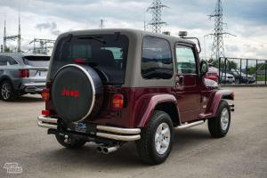 Sarkans Jeep Wrangler 2003 Marijampole, ar dzinēja tilpumu 4.00 L un nobraukumu 22 tūkst. km par 18850 €, foto 14 vietnē AUTOMOTO.COM.LV